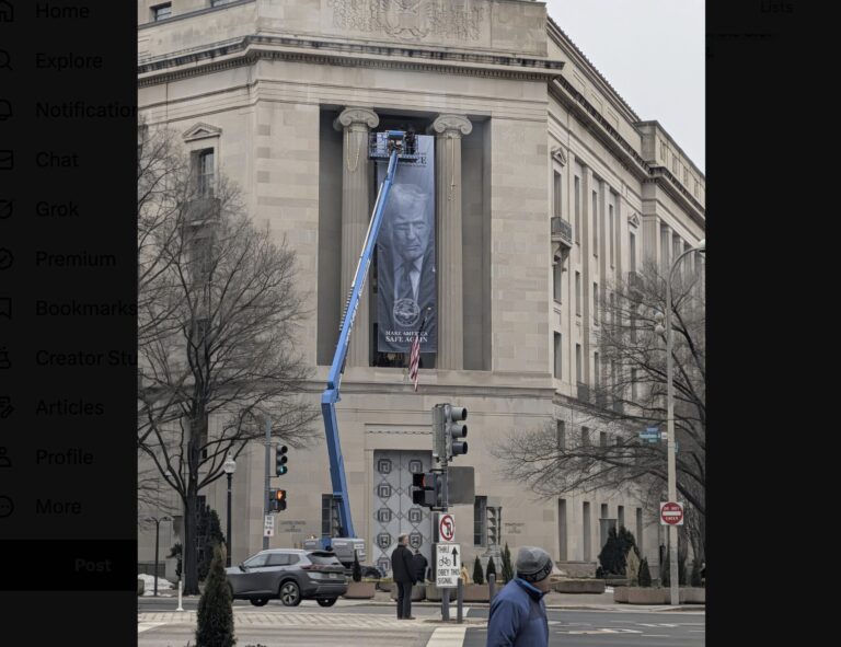 Donald Trump Banner on DOJ Building Draws Propaganda Scorn