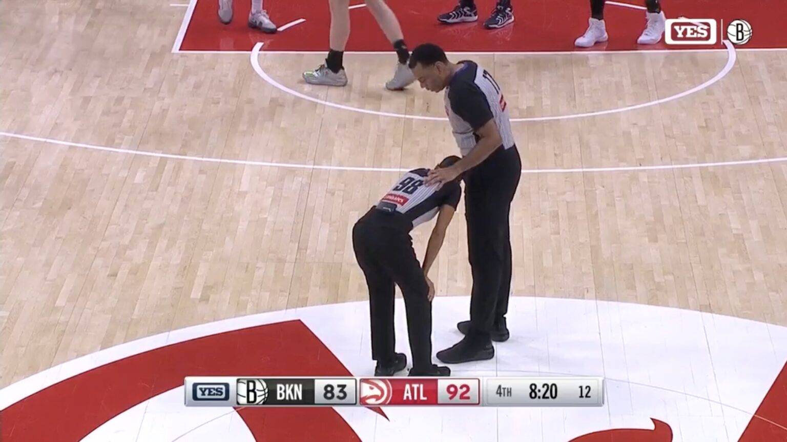 NBA Ref Gets Injured Following Hard Collision with Cameraman